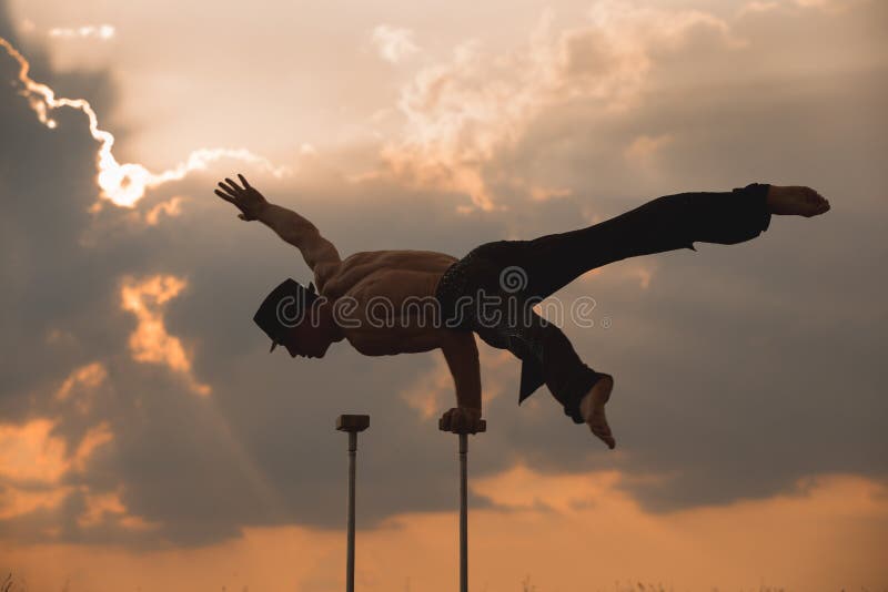 Performance of an Aerialist Outdoors during Sunset Stock Photo - Image ...