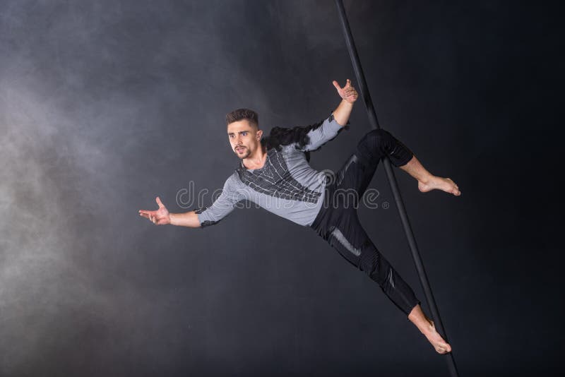 Performance Concept. Man Hanging on Chinese Pole Stock Image - Image of ...