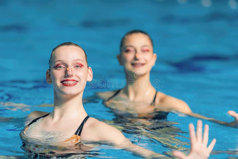 Performance of a Female Synchronized Swimming Duo, Their Fluid ...