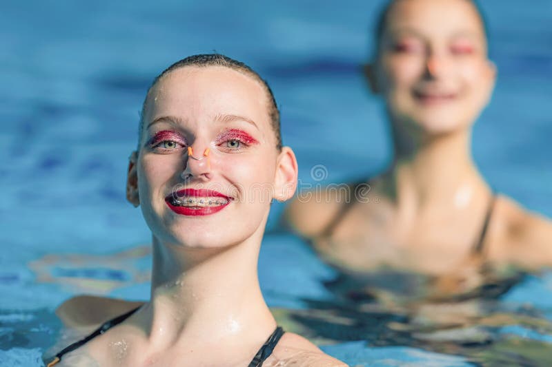 Performance of a Female Synchronized Swimming Duo, Their Fluid ...
