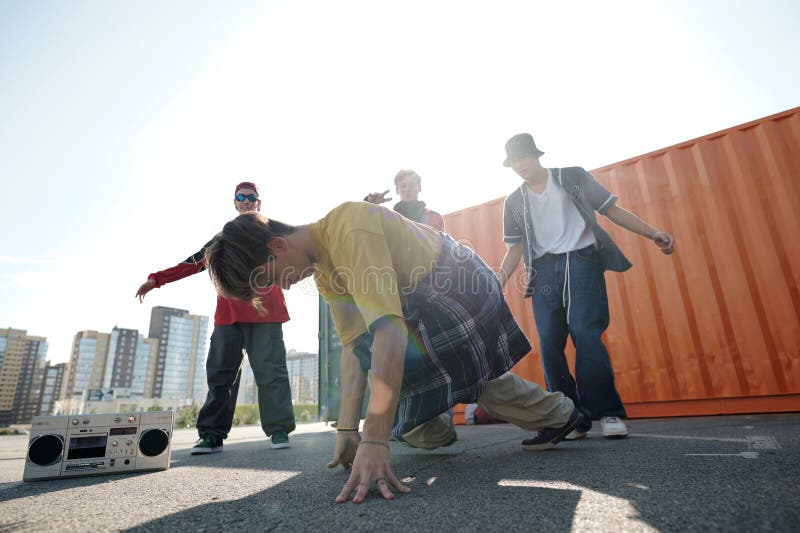 Performing Breakdance Routine on Urban Rooftop during Daytime Stock ...