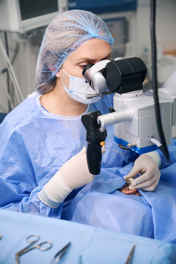 When Performing a Complex Operation, Surgeon Uses Special Optical ...