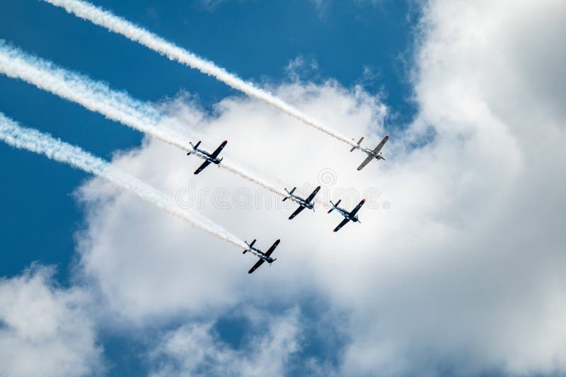 Performing Fighter Planes Flying in Formation Stock Photo - Image of ...