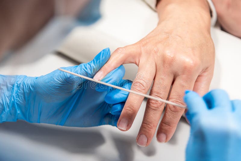 Performing Manicure Work in a Beauty Salon Stock Photo - Image of nail ...