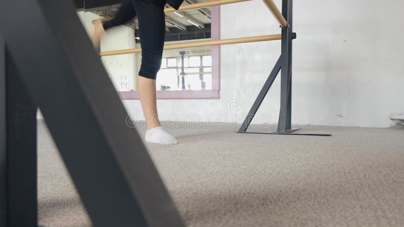 Performs Ballet Exercises, Leg Back. Dance School Training Stock Video ...