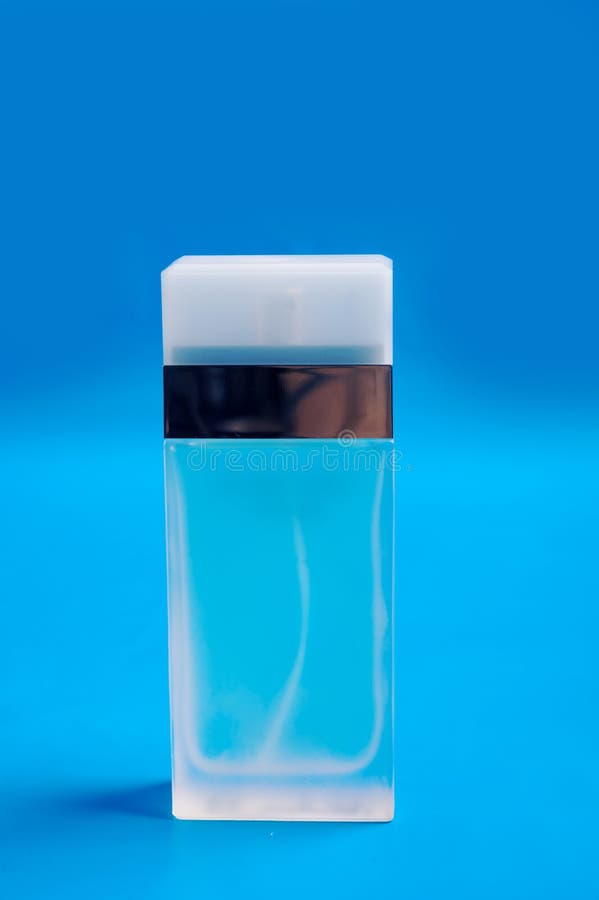 Perfume Bottle Around Blue Background Stock Image - Image of female ...