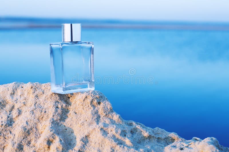 Perfume Bottle on Blue Background Stock Photo - Image of atomizer ...