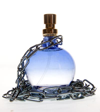 Perfume bottle and chain stock photo. Image of contained - 12506070