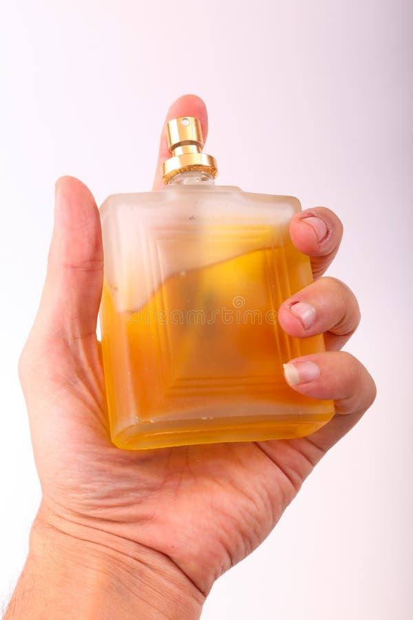 Hand Holding Perfume Bottle Stock Image - Image of luxury, elegance ...