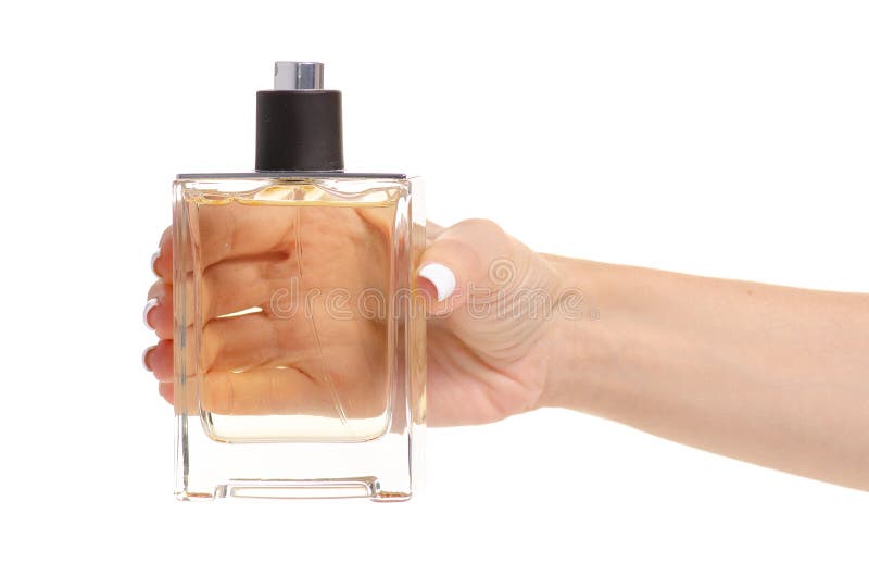 Perfume bottle in hand stock photo. Image of aroma, hygiene - 123334150