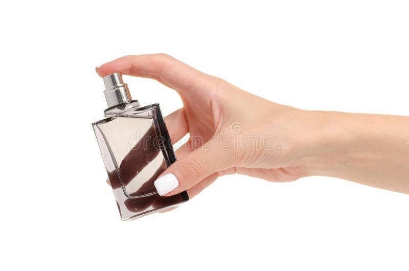Perfume bottle in hand stock photo. Image of femininity - 123333846