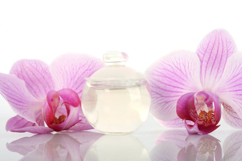 Perfume bottle and orchids stock photo. Image of bright - 19453640