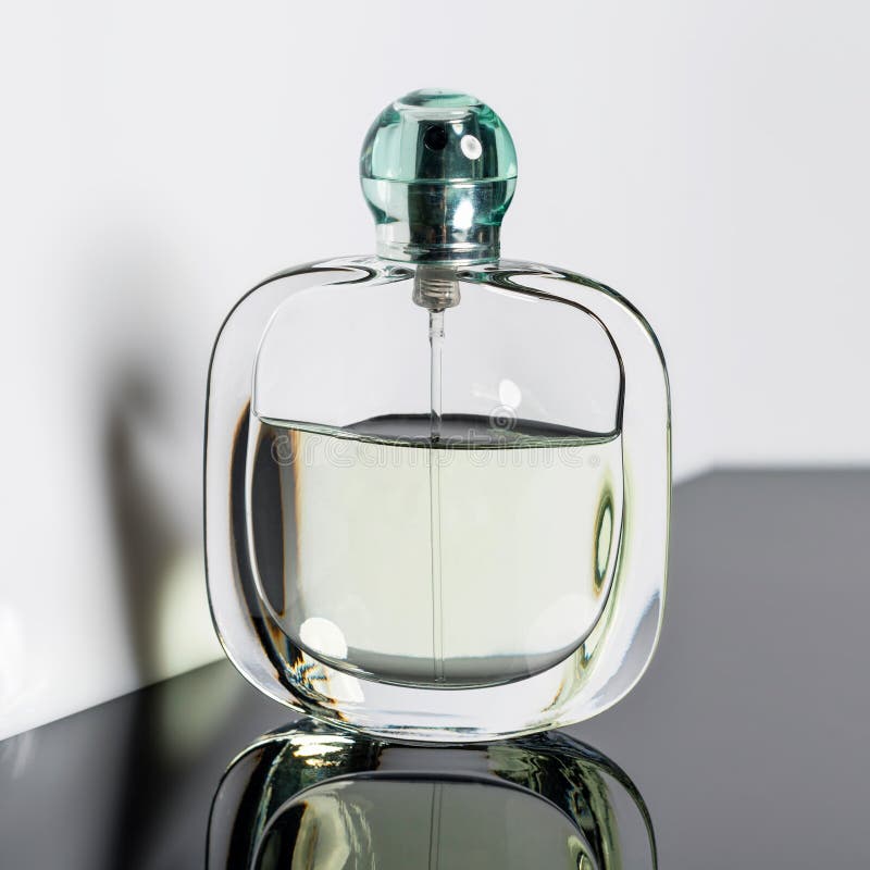 Perfume Bottle with Reflection on White Background. Perfumery ...