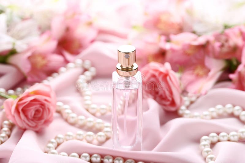 Perfume bottle with roses stock photo. Image of liquid - 127962138