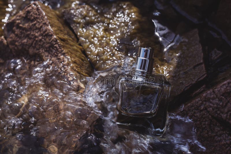 Perfume with Splash of Water Stock Image - Image of macro, blue: 151691831