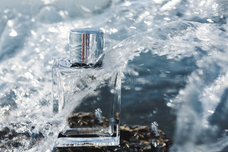 Perfume Bottle In Water Splashes Isolated On White Stock Photo - Image ...