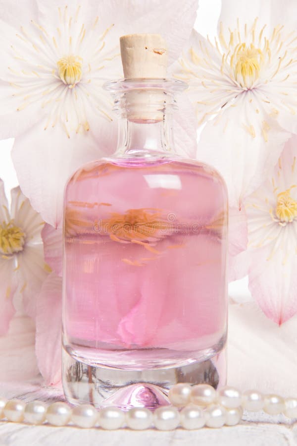 Perfume Bottle and White Flowers Stock Image - Image of wooden, fresh ...