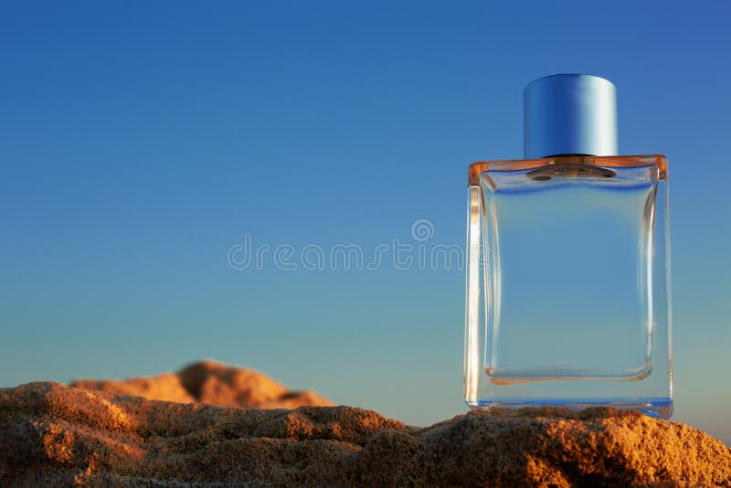 Perfume Bottles Against the Evening Sunset. Beauty Concept. Stock Image ...