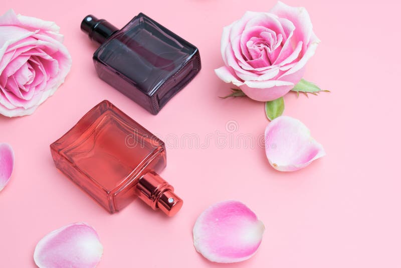 Perfume Bottles on Pink Background Stock Photo - Image of care, color ...