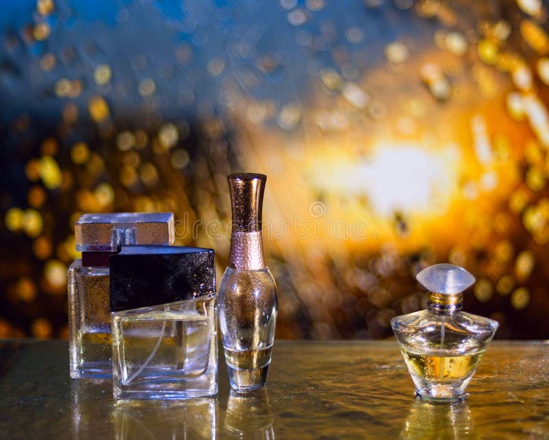 Perfume Bottles Under the Autumn Rain with Water Drops Stock Image ...