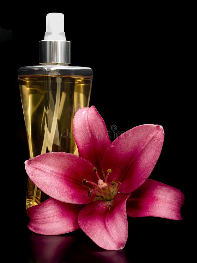 Perfume con lilly foto de archivo. Imagen de negro, vertical - 10111218