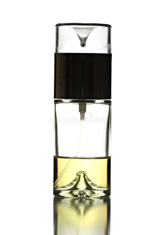 Perfume Del Oro Con La Botella Blanca Aislada. Imagen de archivo ...