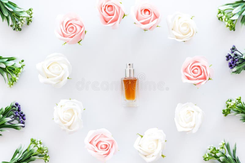 Perfume and Flowers Composition on White Background Top View Pattern ...
