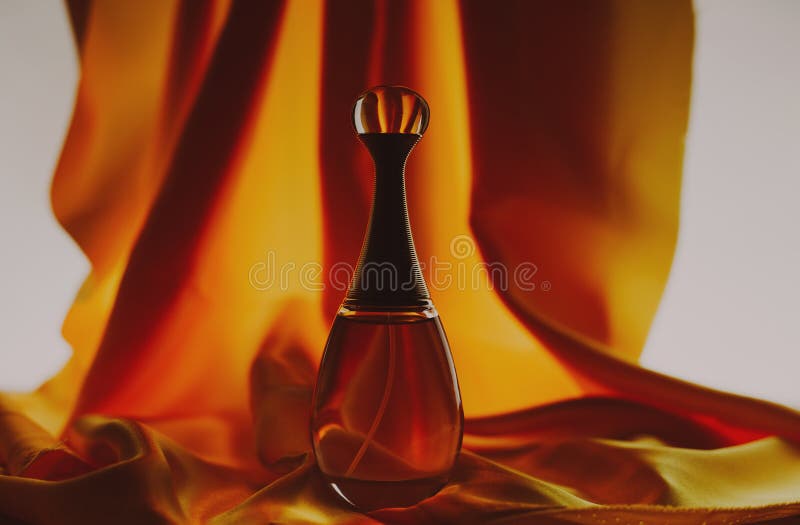 Perfume and flowing fabric stock image. Image of smooth - 354349577