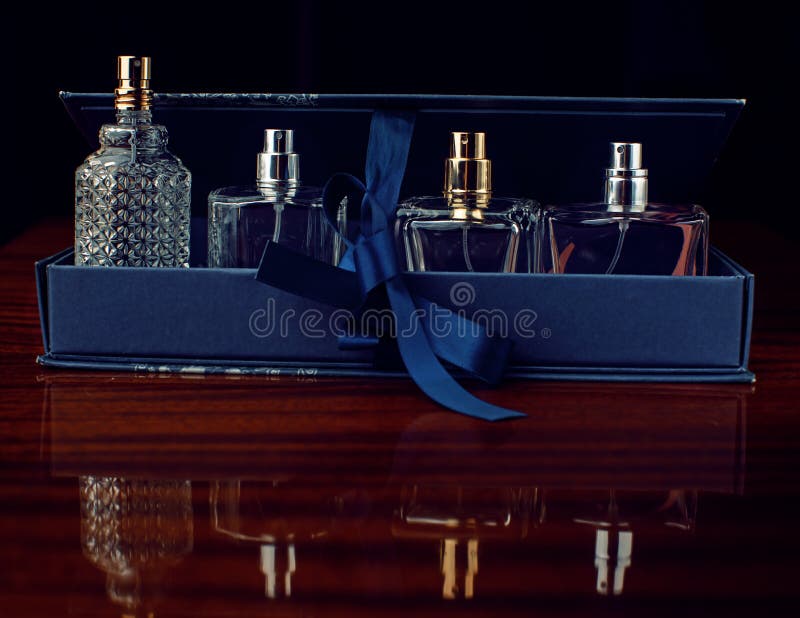 Perfume In A Gift Set On Black Background Stock Photo - Image of ...