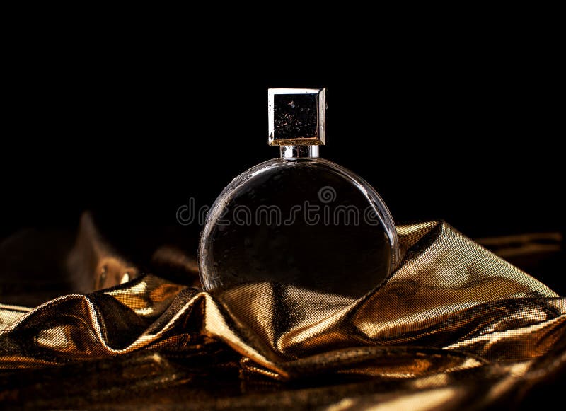 Perfume in gold tones stock photo. Image of spray, feminine - 66781716