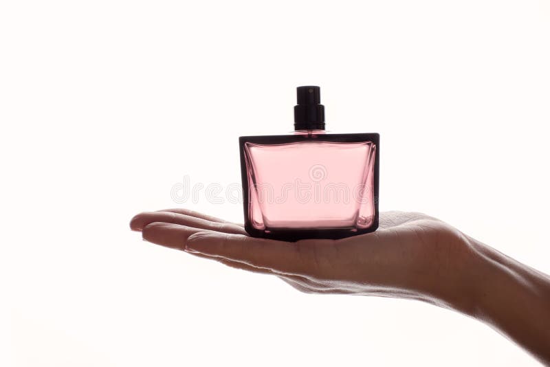 Perfume in hand stock photo. Image of fruity, cologne - 63830402