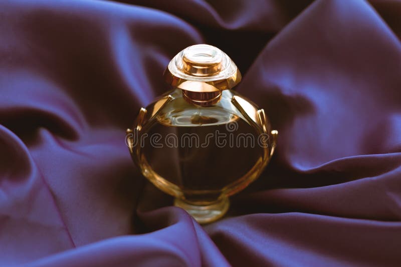 Perfume on luxury fabric stock photo. Image of rich - 326923370
