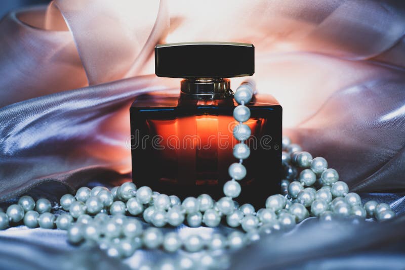 Perfume with pearls stock image. Image of decoration - 151416889