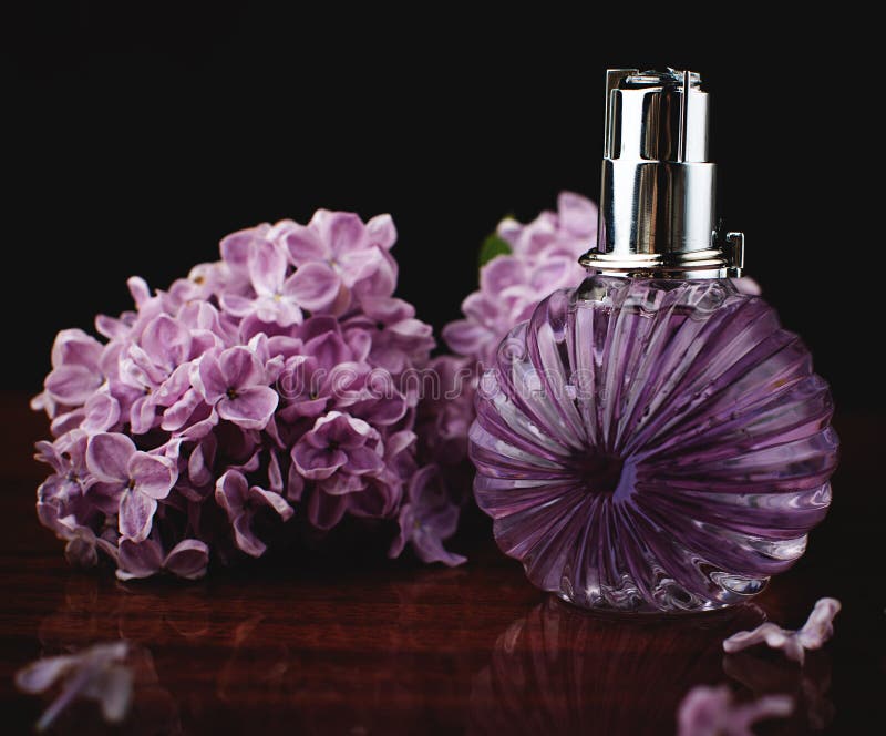 Perfume and purple flowers stock photo. Image of dating - 71840072