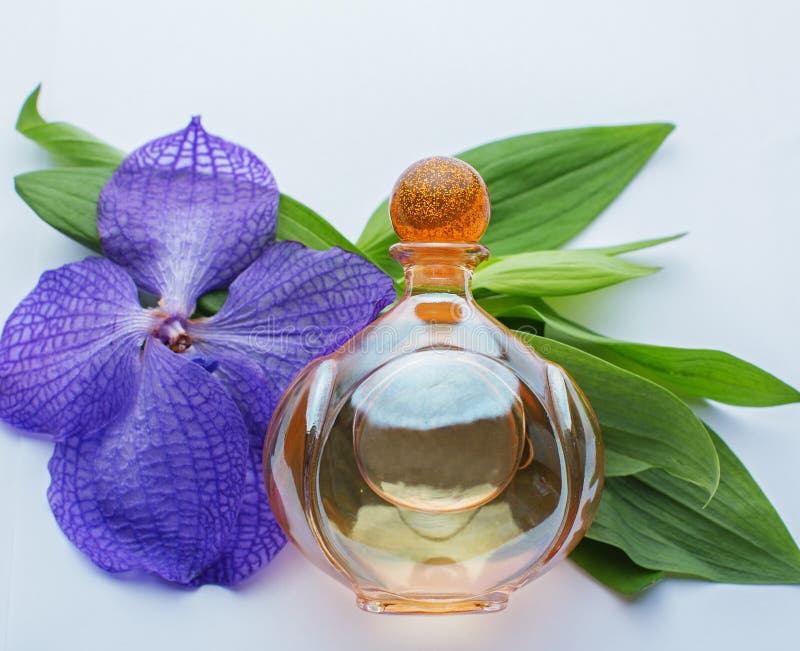 Perfume and purple orchids stock image. Image of orchids - 61256641