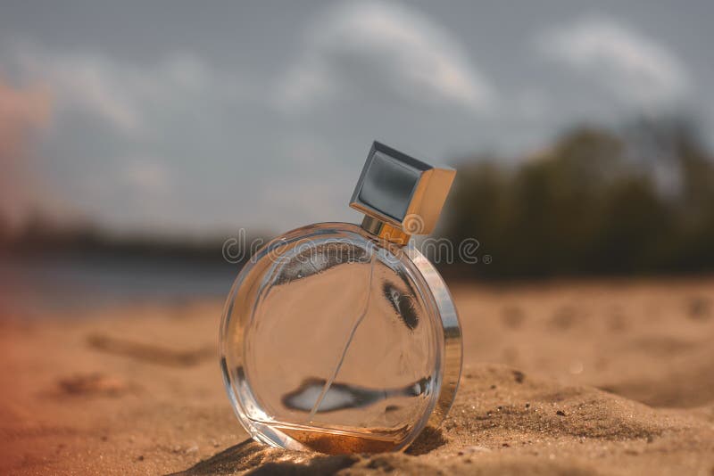 Perfume on the sand stock image. Image of skincare, glass - 115588165