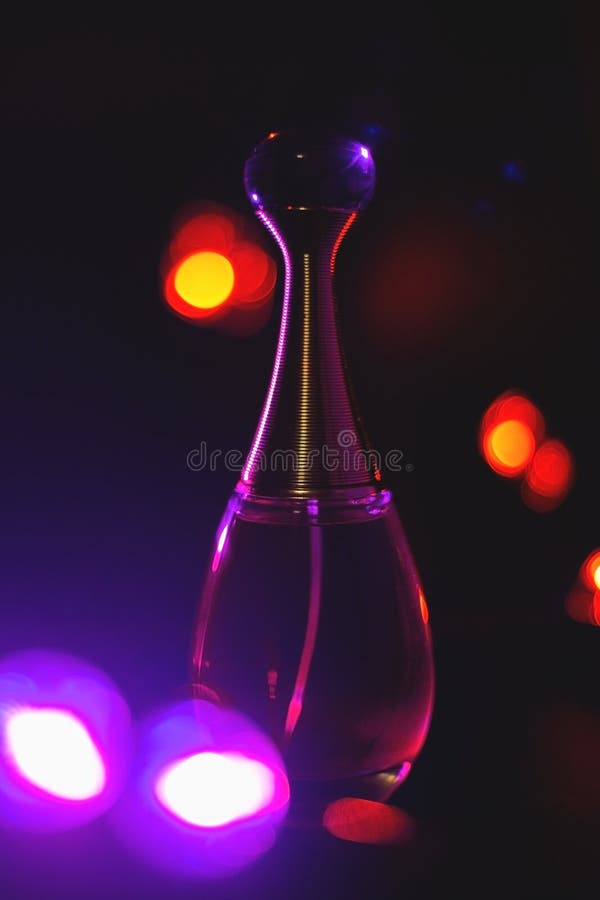 Perfume with Sparkling Lights, Glittering, Vibrant Colors Stock Photo ...