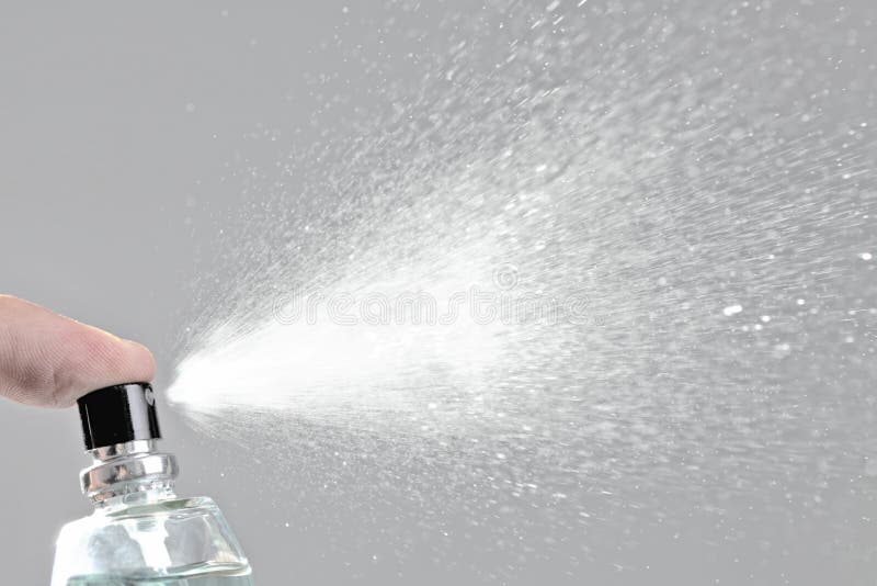 Spraying perfume stock photo. Image of inside, deodorizer - 16747706
