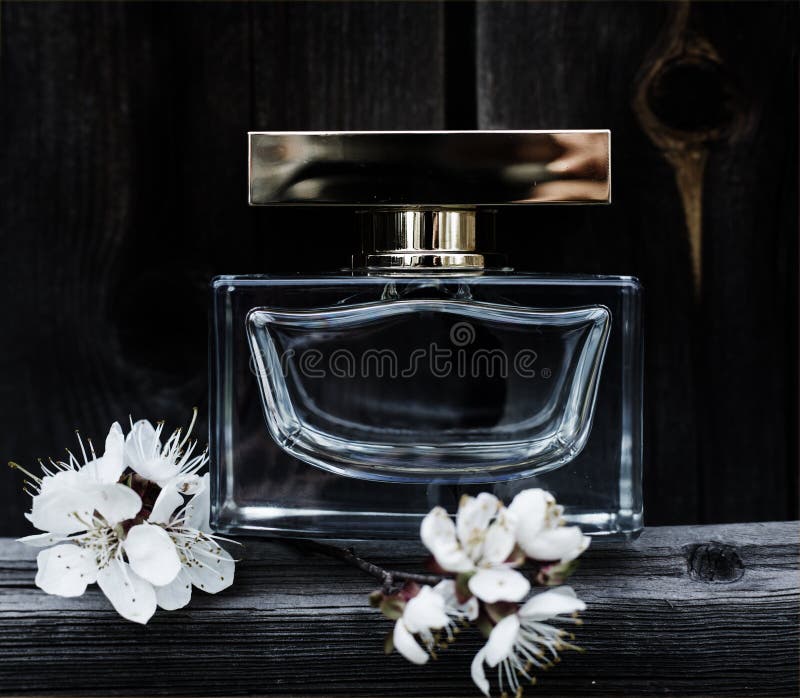 Perfume with Spring Flowers Stock Photo - Image of bottle, merchandise ...