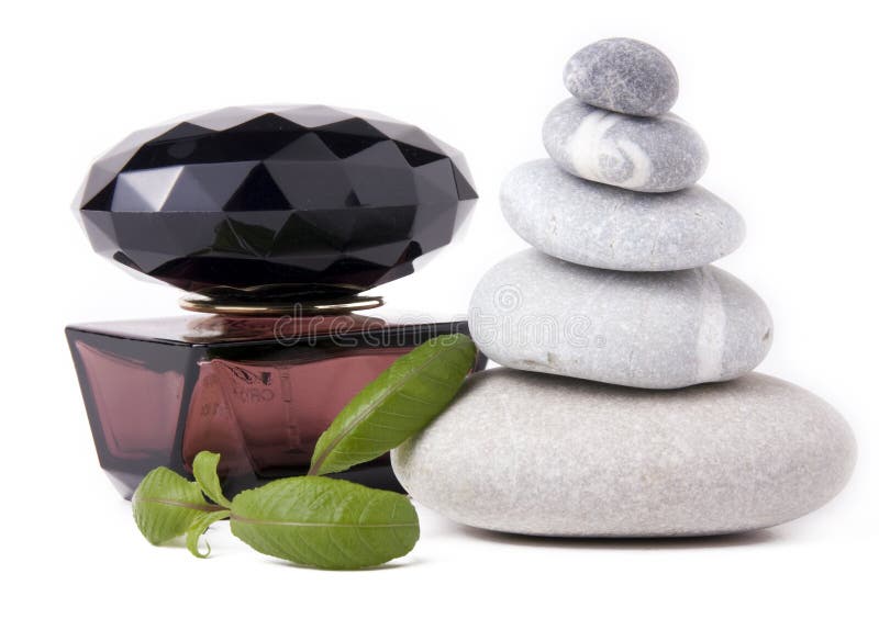 Perfume, Stones and Green Leafs Stock Photo - Image of order ...