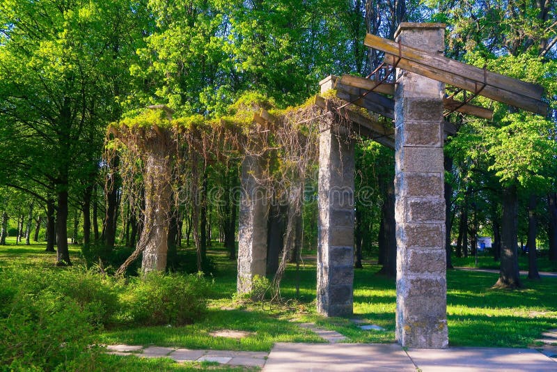 Pergola Made of Stone Pillars in the Park Stock Image - Image of ...