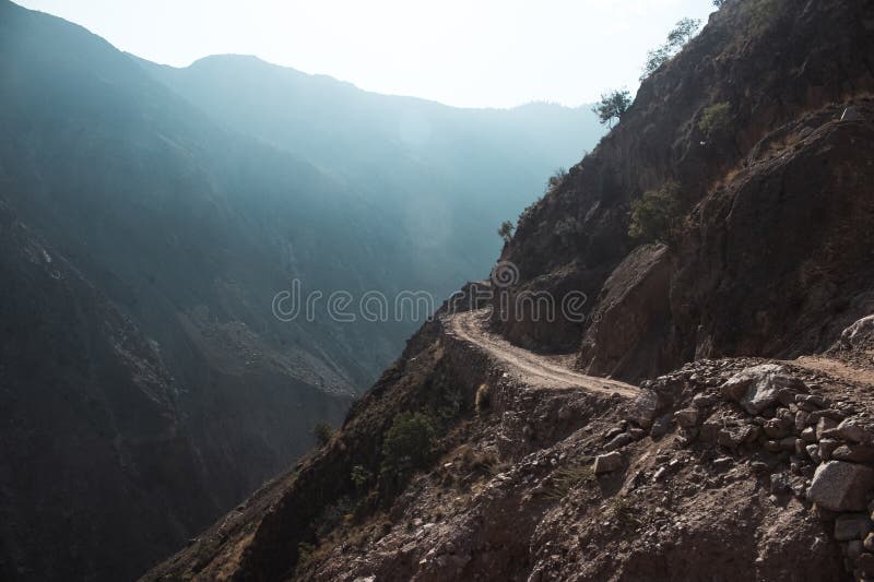 Perilous Mountain Path stock photo. Image of dirt, adventure - 347459064