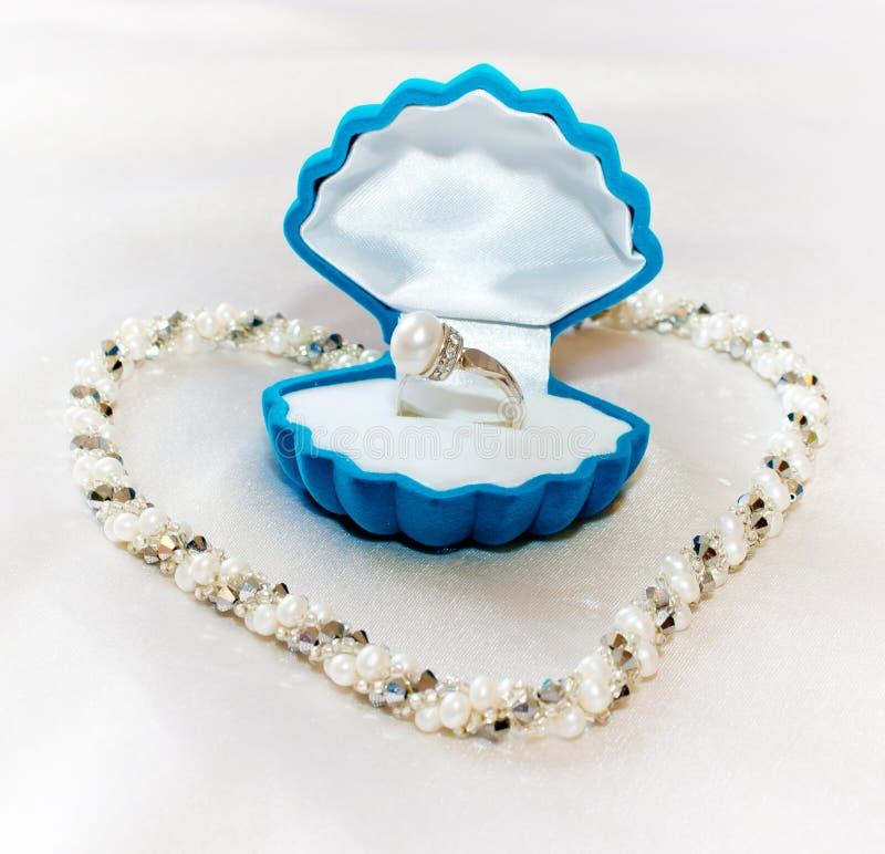 The Perl Ring and the Pearl Necklace Stock Image - Image of gold, cloth ...
