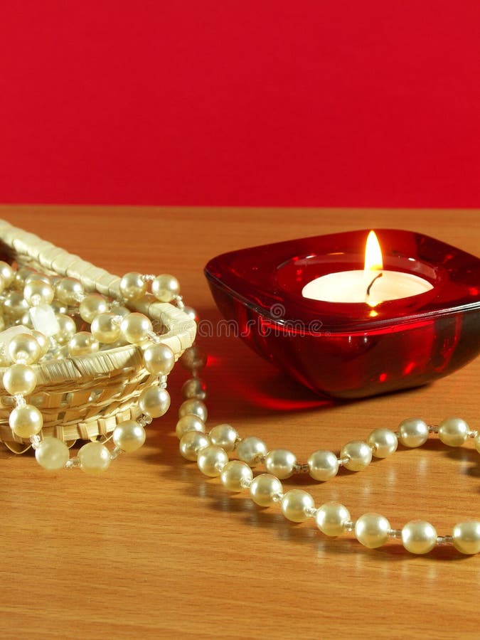 Pearls in candle light stock photo. Image of candle, object - 411144