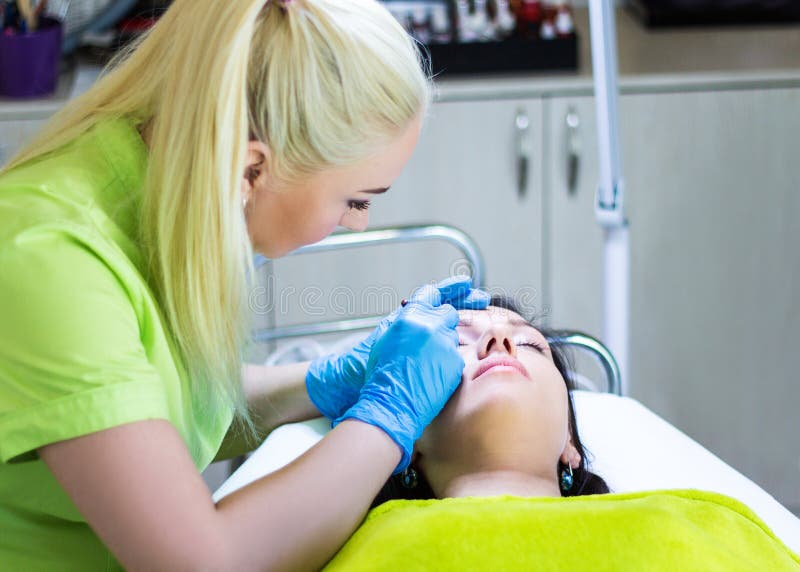 Permanent Eyebrow Make Up - Cosmetician Preparing Client for Pro Stock ...
