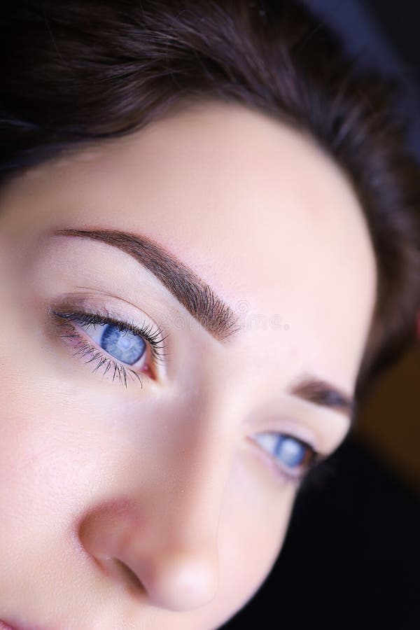 Permanent Eyebrow Makeup Close-up. Model Girl with Blue Eyes Stock ...