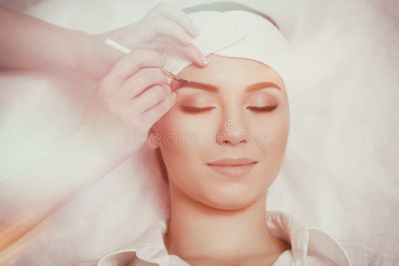 Permanent Make-up Wizard Makes Eyebrow Correction Procedure Stock Image ...