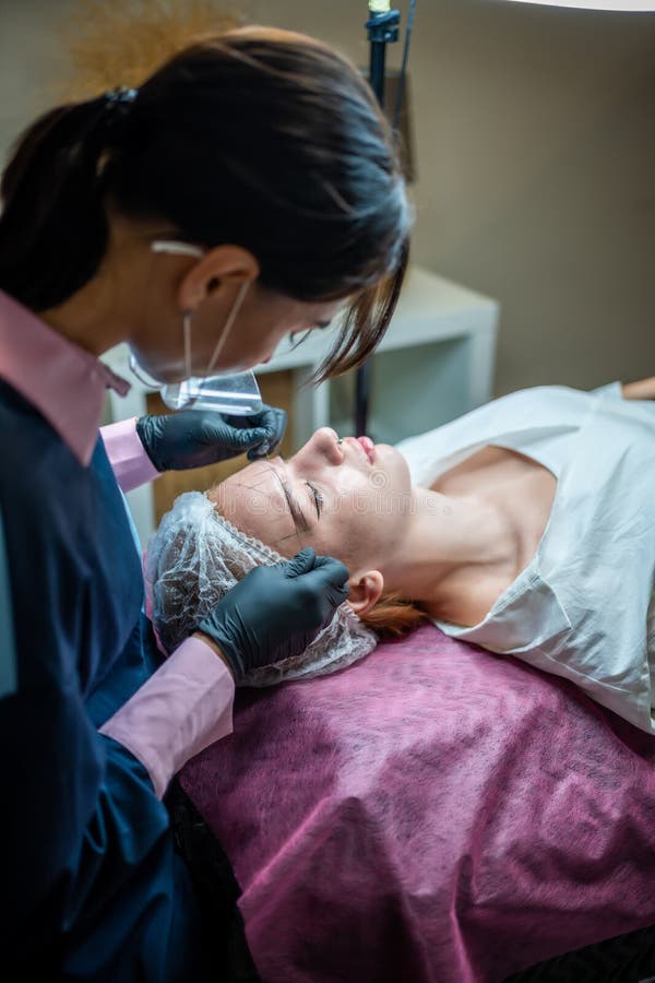 Permanent Makeup Cosmetologist Master Takes Measurements for the New ...