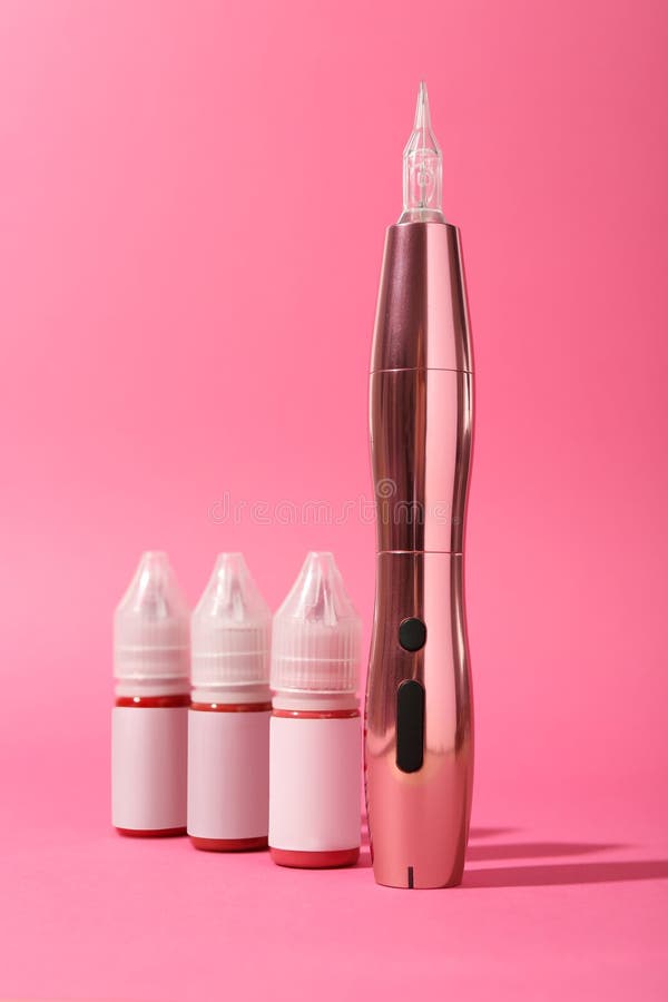 Permanent Makeup Machine and Pigments on Pink Background Stock Image ...