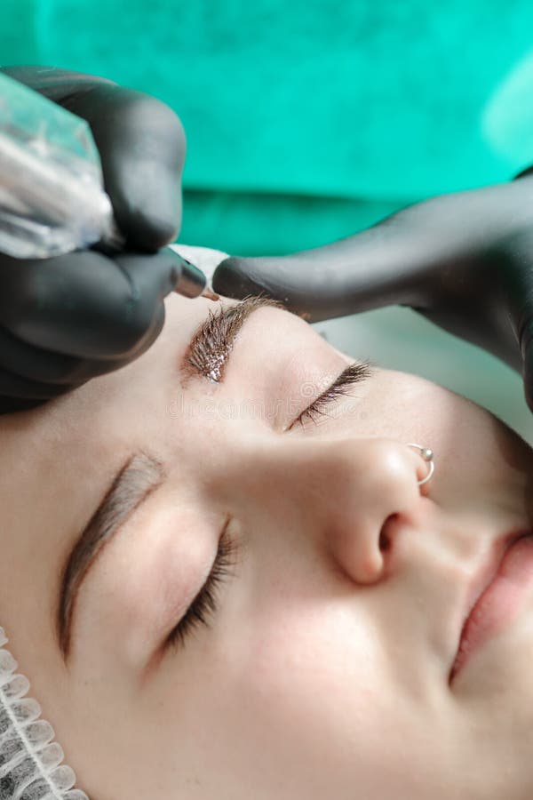Permanent Makeup. Permanent Tattooing of Eyebrows Stock Image - Image ...